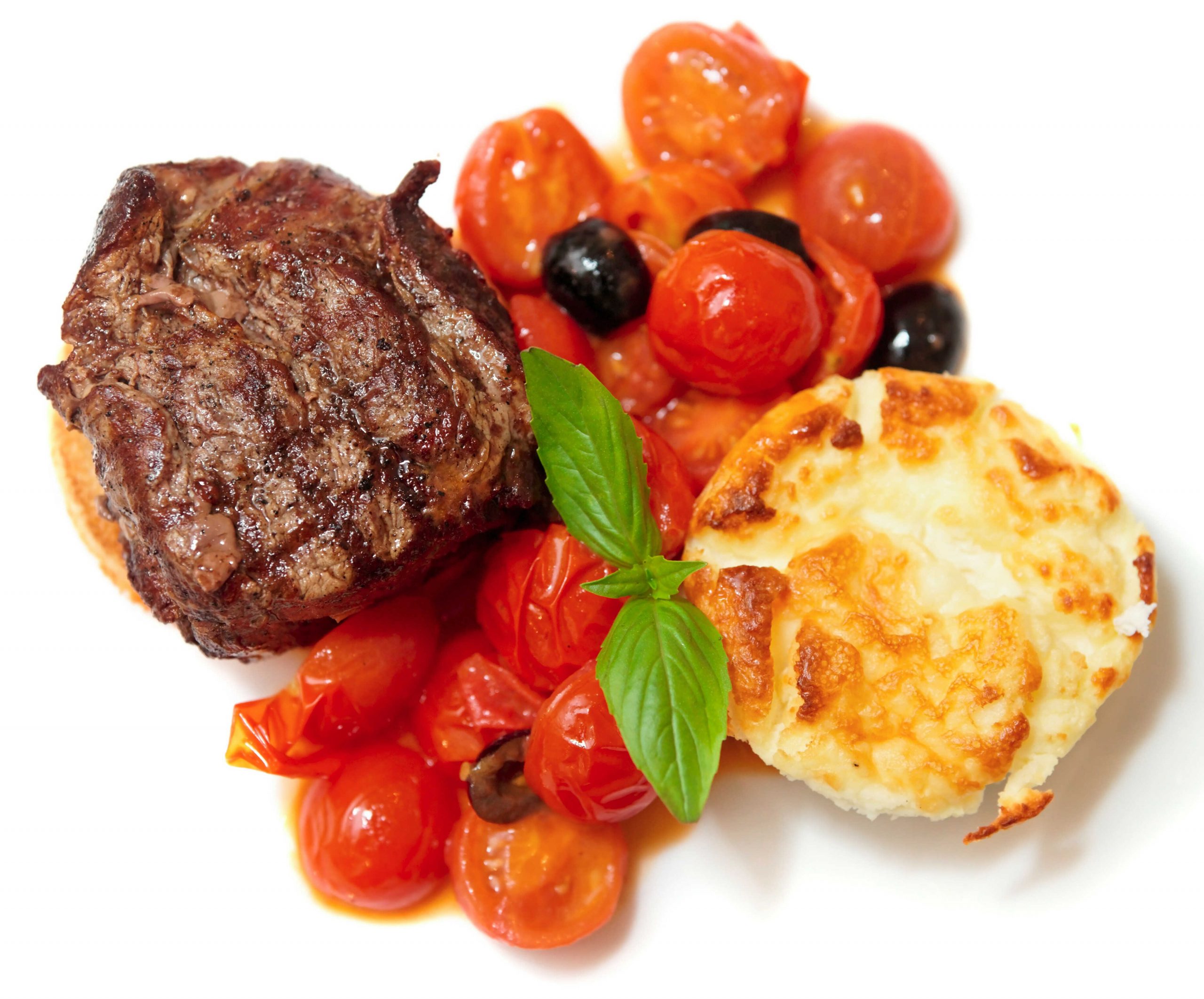 Solomillo de añojo a la mostaza con tomates salteados